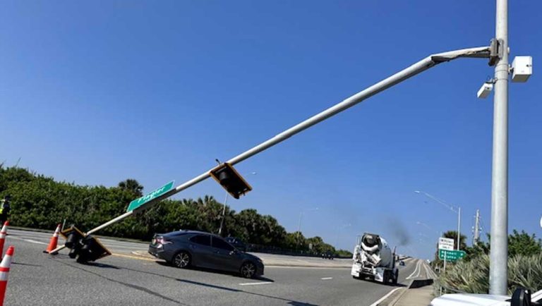 A Mast Arm Crashes Onto State Road 100 at the Foot of the Flagler Beach ...